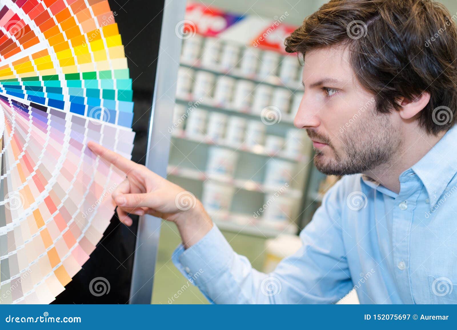 Man Pointing To Colour on Paint Chart Spectrum Stock Image - Image of ...