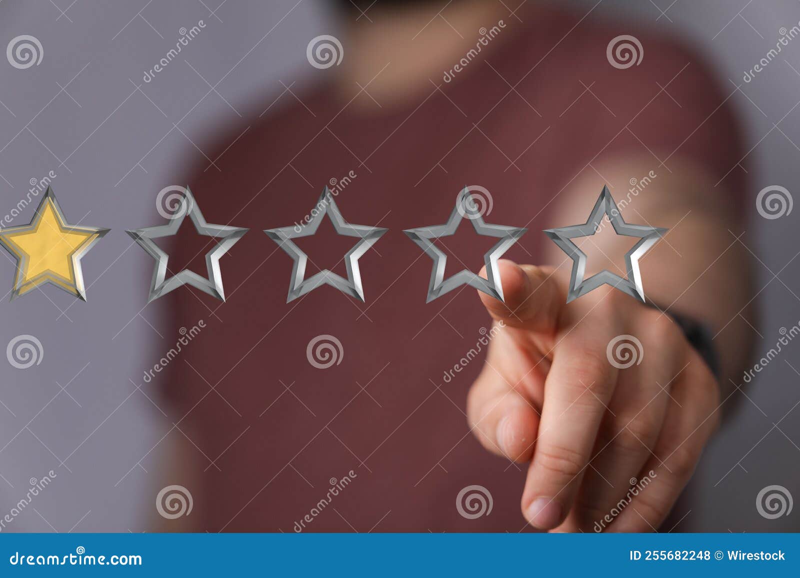 Man Pointing To an Illustrated Five-star Feedback with a Blurry ...