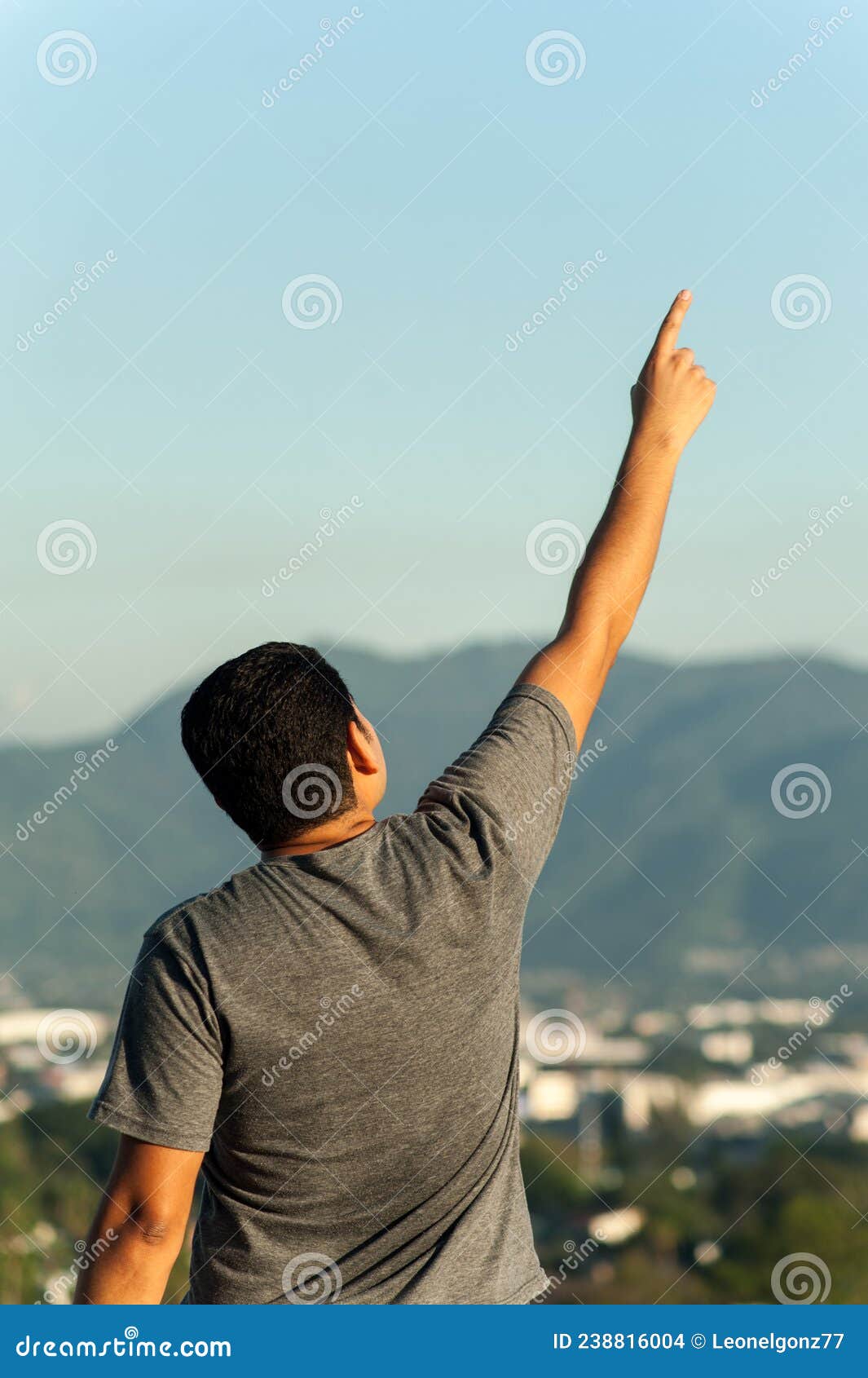 Man points up stock photo. Image of hands, blue, travel - 238816004