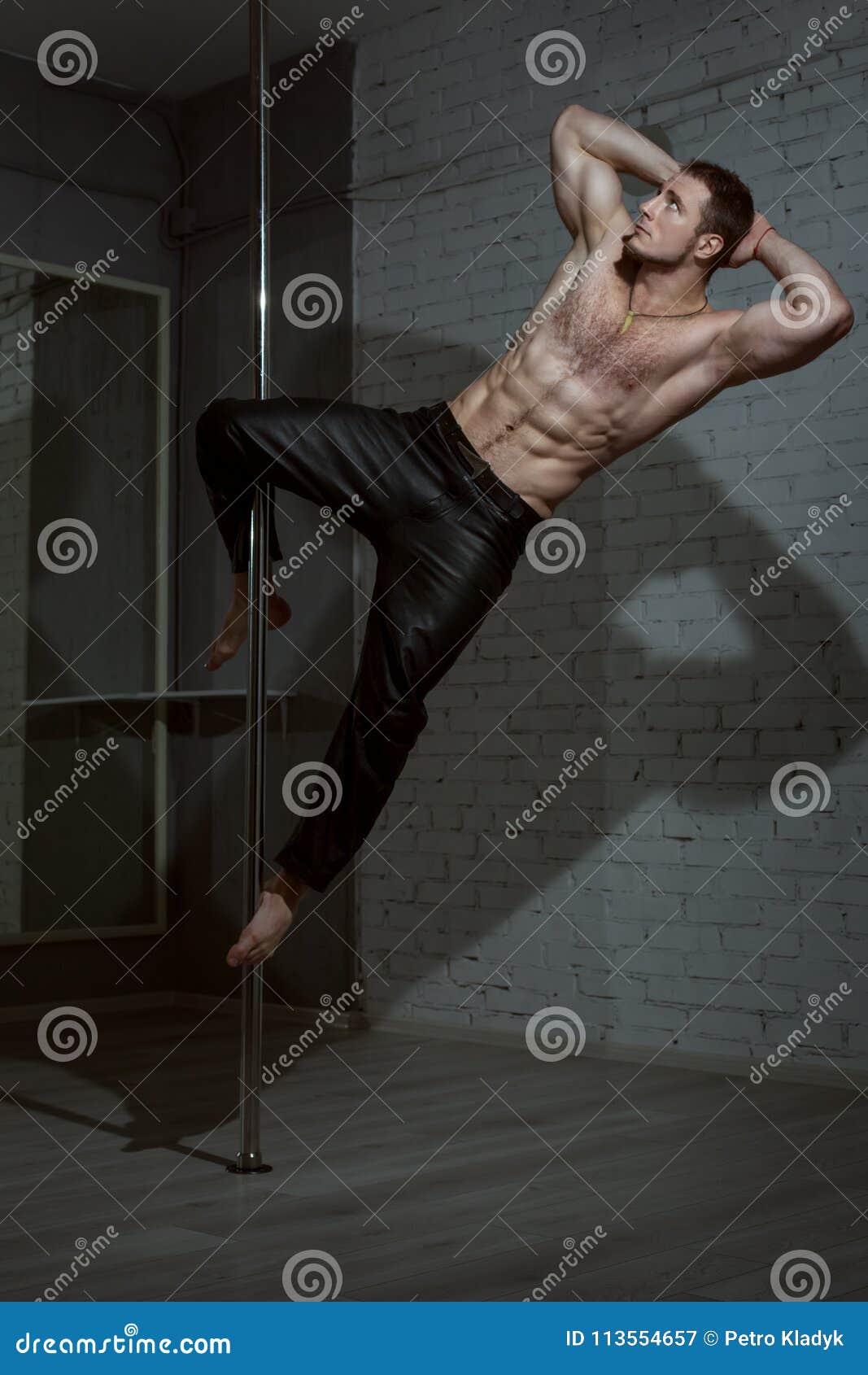 Man on a pole for dancing. stock image. Image of health - 113554657