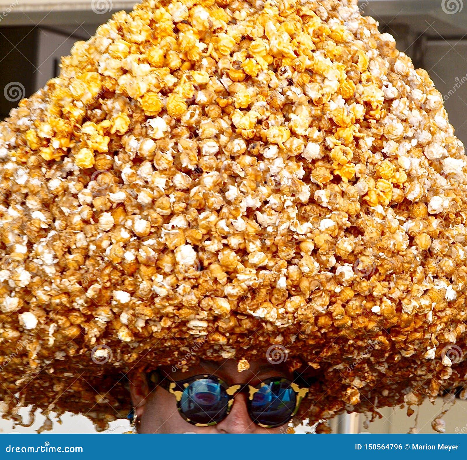 Man Wearing a Big Popcorn Hat Stock Photo - Image of drinking, irish ...