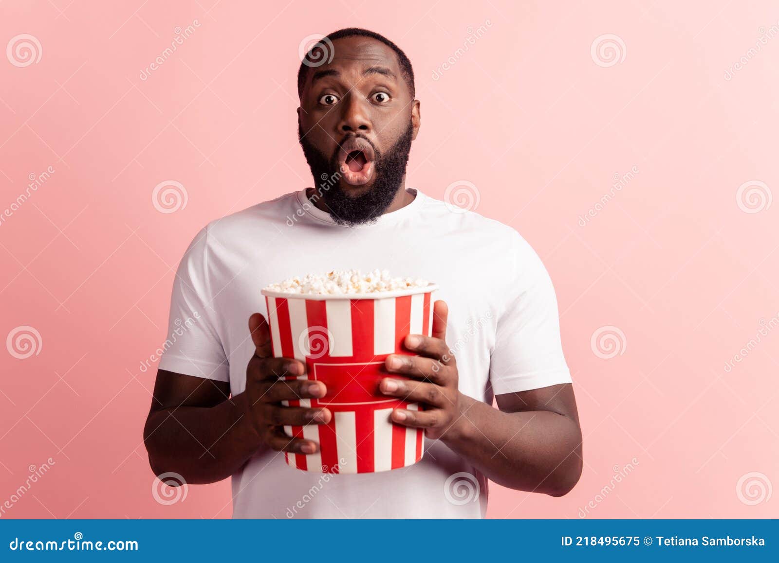 Man with Popcorns Shocked Face on Pink Wall Stock Image - Image of ...
