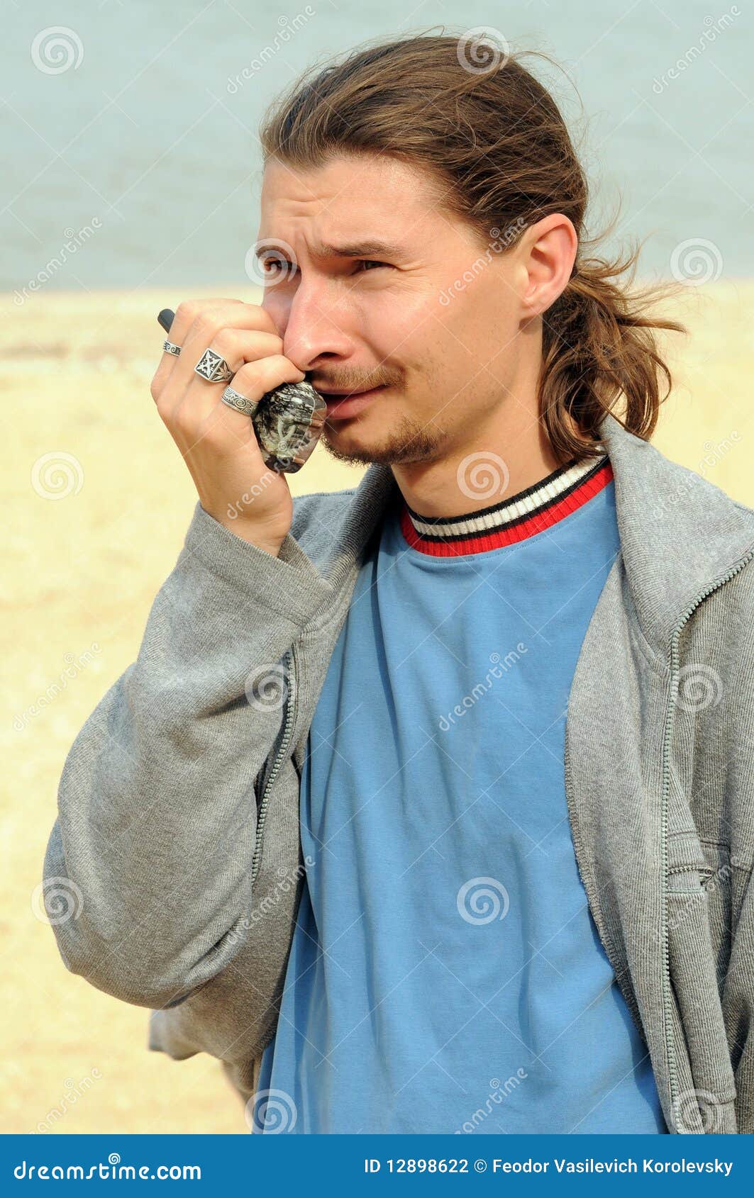 The Man and a Portable Radio Set. Stock Photo - Image of haired, holds ...