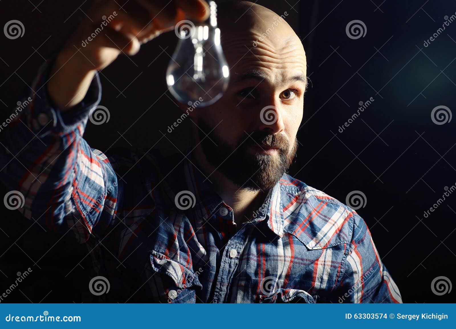 Man Portrait with Light Bulb Stock Photo - Image of dark, creative ...