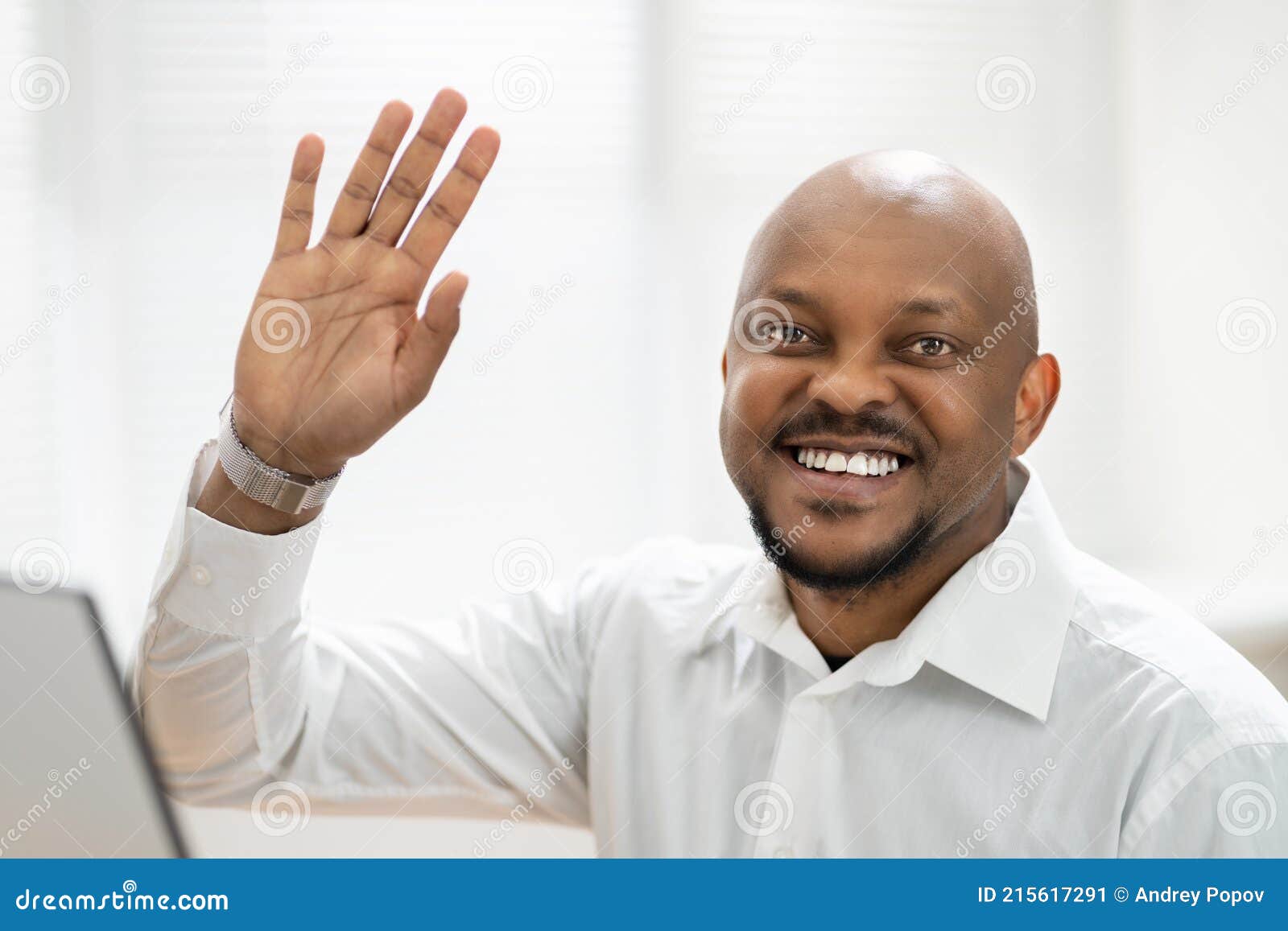 Man Portrait Waving Hello stock image. Image of confident - 215617291