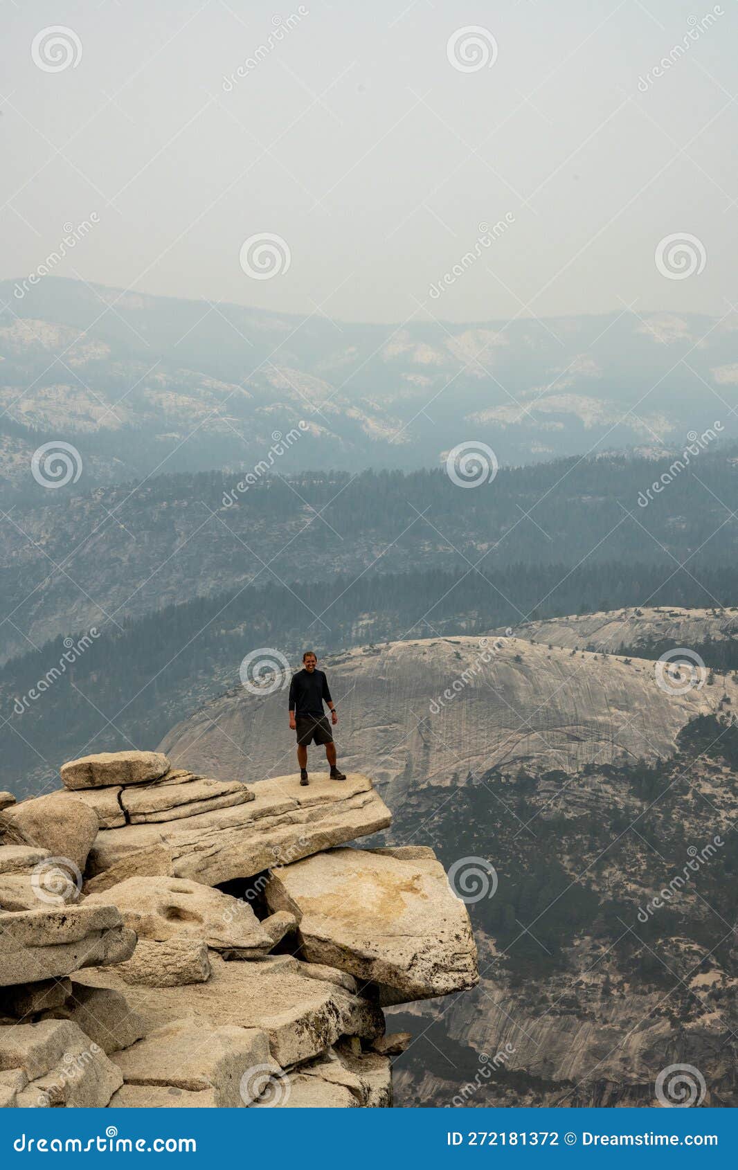 Man Poses on the Edge of Half Dome Stock Photo - Image of natural ...