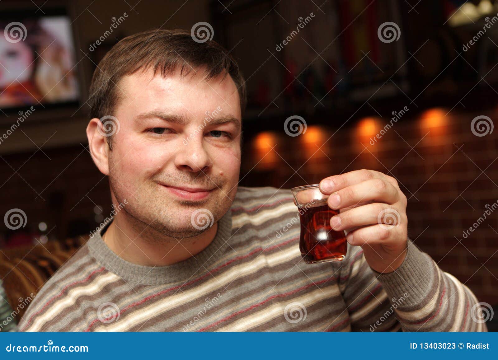 Man poses with tea stock image. Image of heat, drink - 13403023