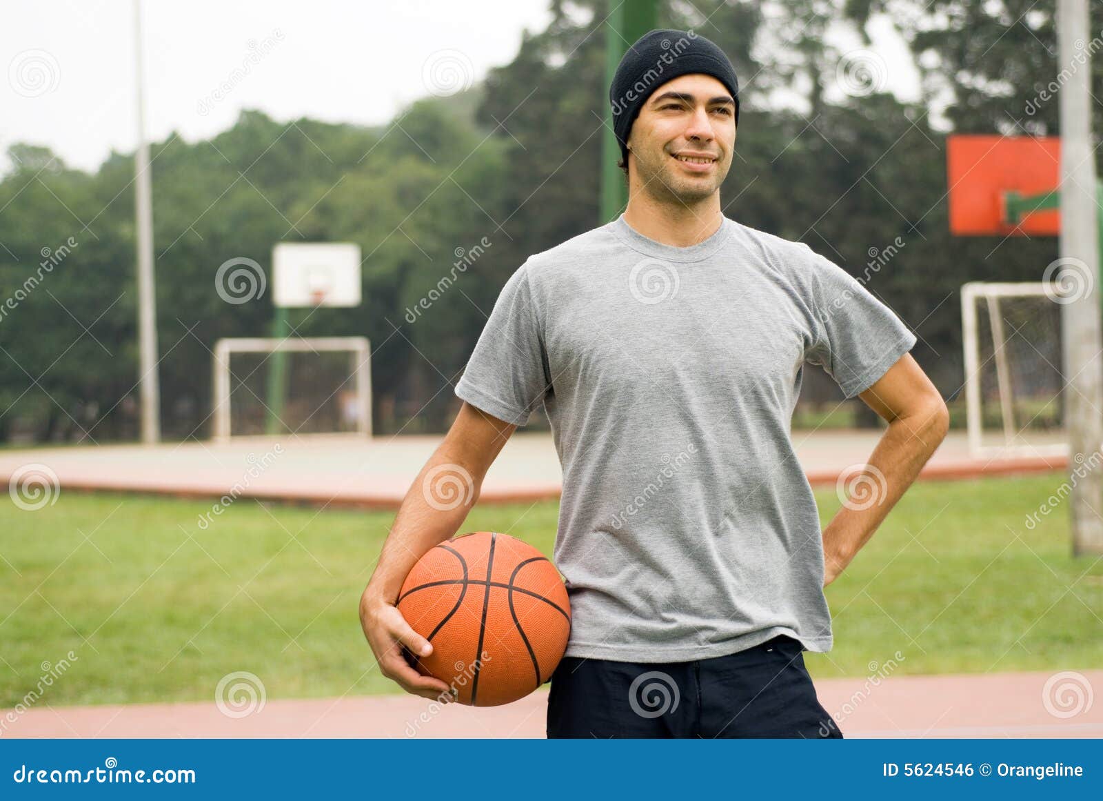 Man Posing with Basketball - Horizontal Stock Photo - Image of male ...