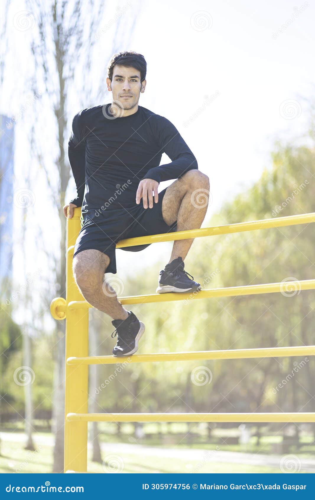 Man Posing after Doing Climbing Vertical Exercise in the Park Stock ...