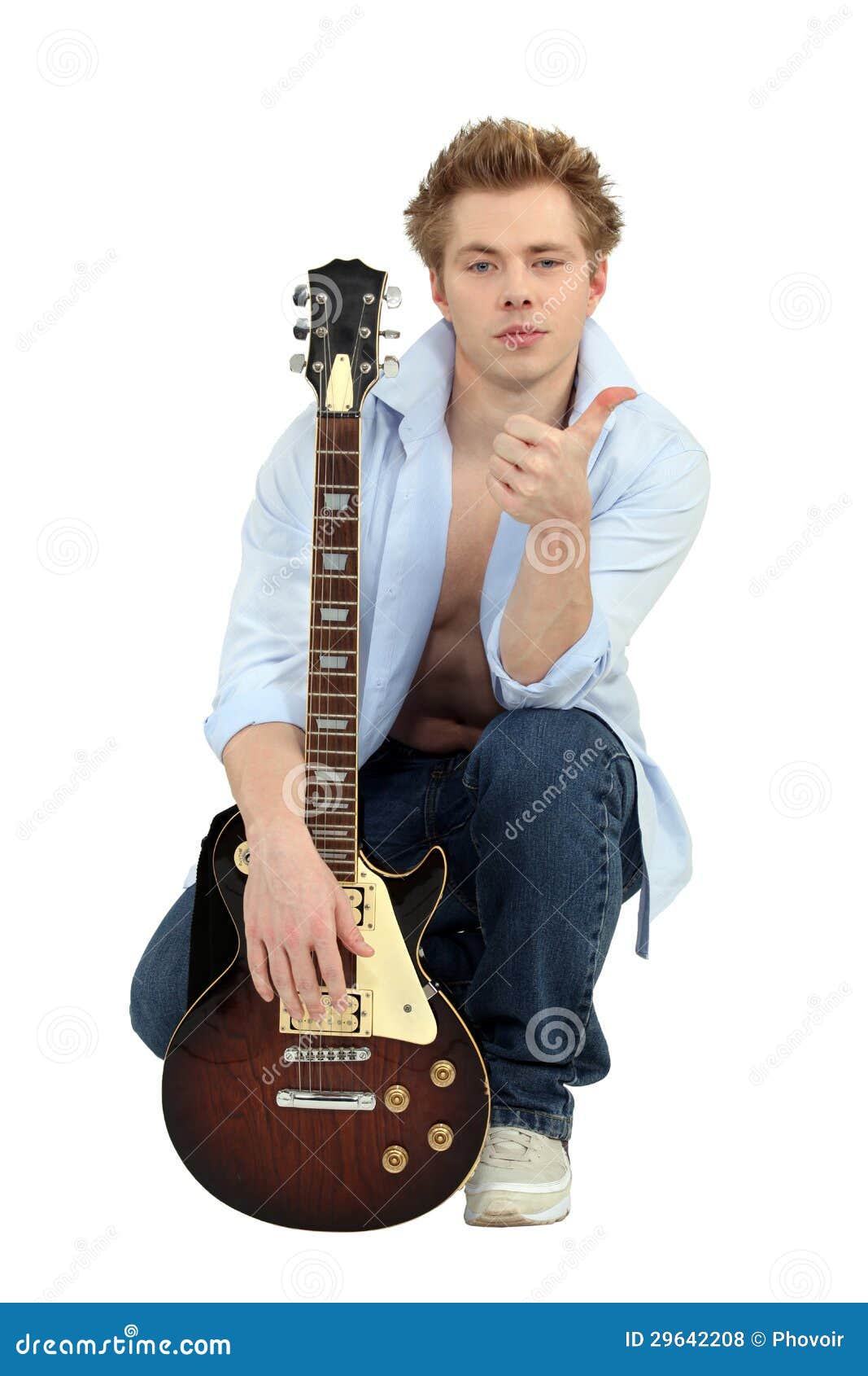 Man posing with his guitar stock photo. Image of conceit - 29642208