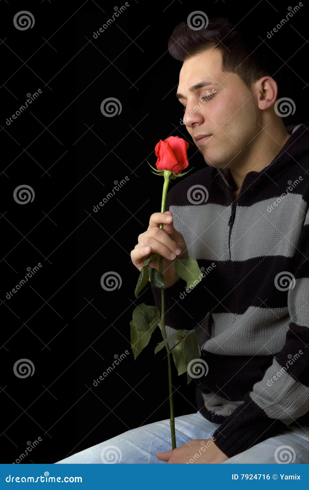 Man in posing with rose stock photo. Image of sensitive - 7924716