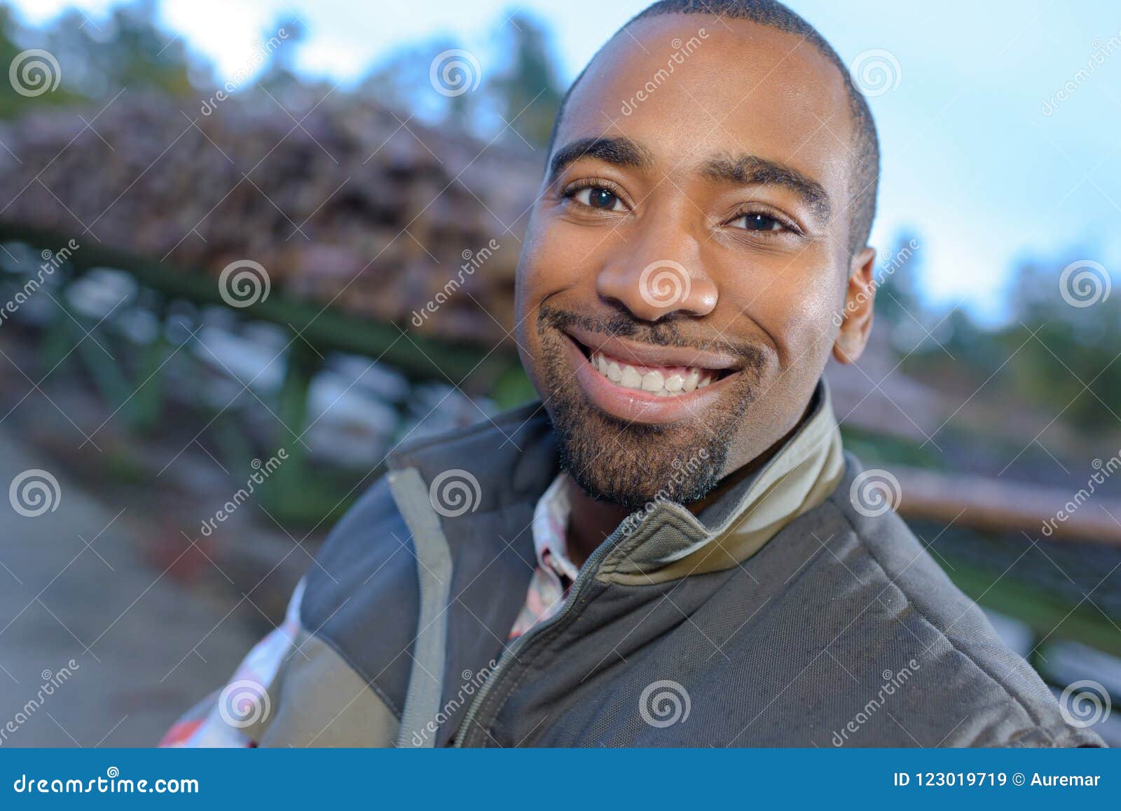 Man posing and smiling stock image. Image of employee - 123019719