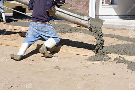 Man Pouring Concrete stock photo. Image of parking, dirt - 12032056