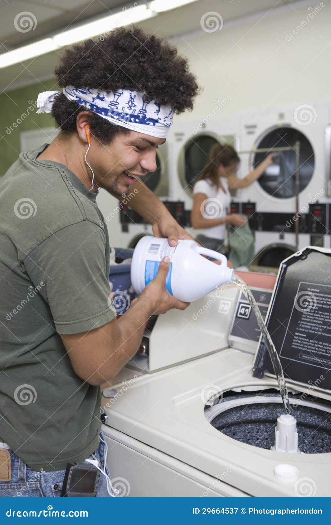 Man Pouring Liquid Solution in Washing Machine Stock Image - Image of ...