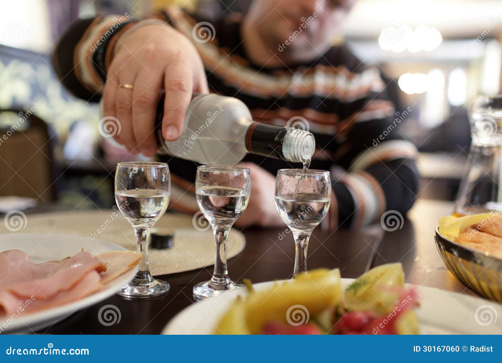 Man Pouring Vodka in Taverna Stock Photo - Image of hard, indoor: 30167060
