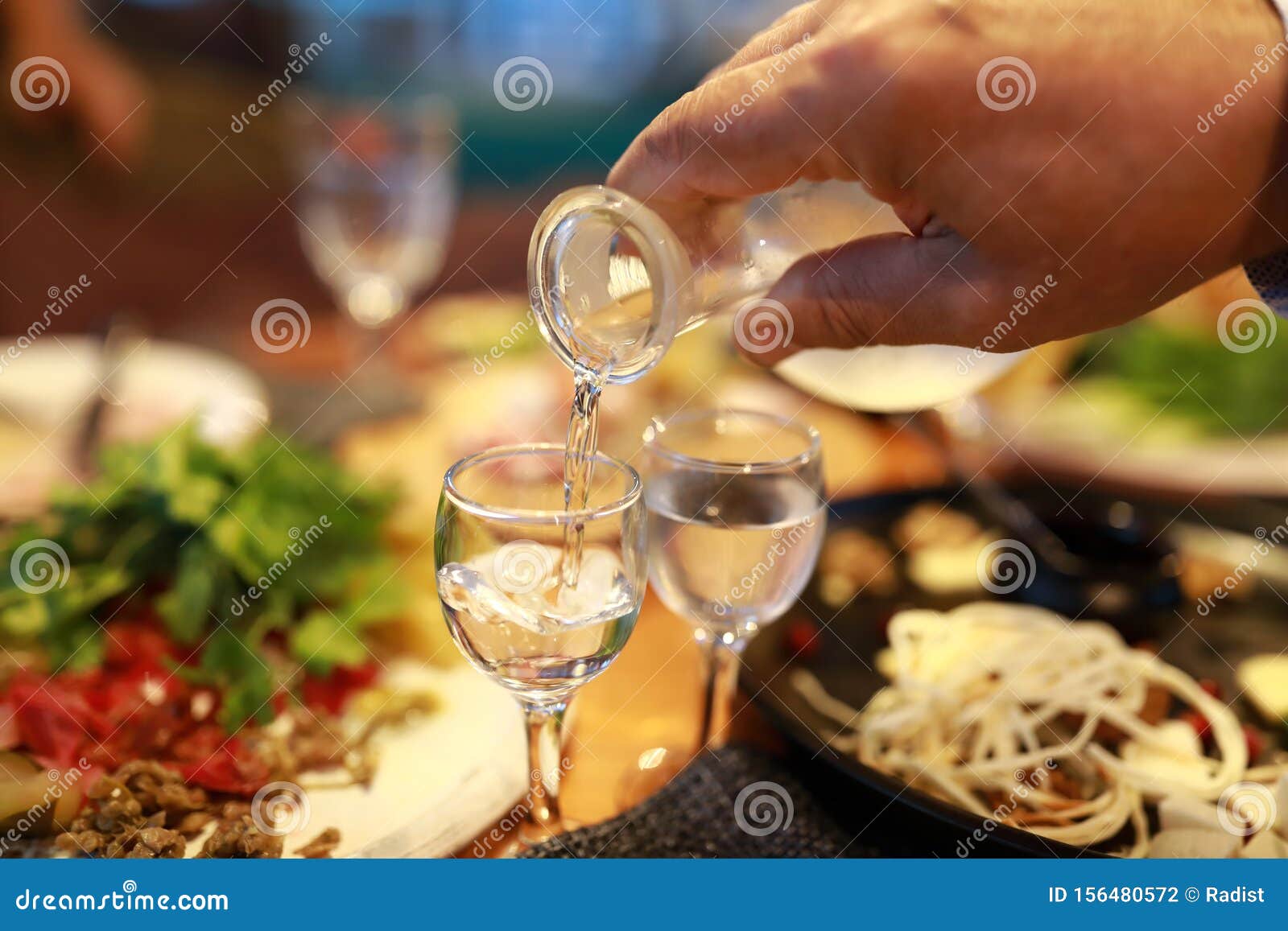 Man pouring vodka stock photo. Image of barman, liquor - 156480572