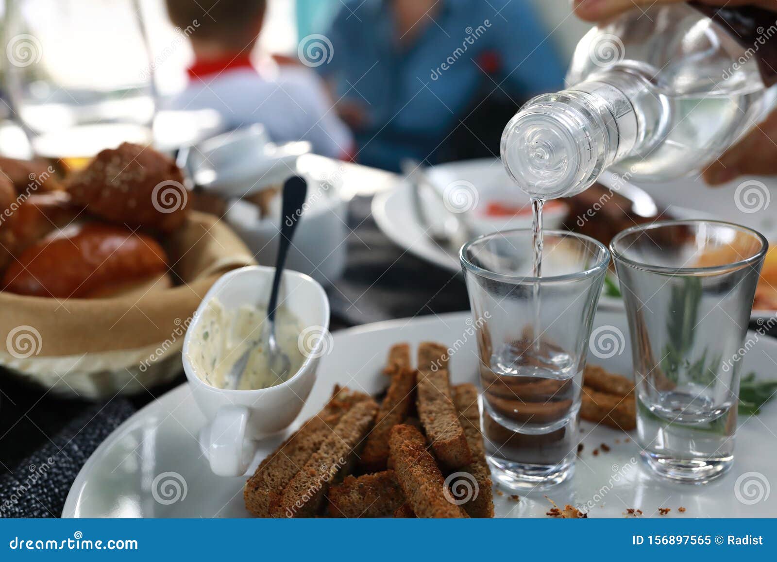 Man Pouring Vodka into Glasses Stock Image - Image of liquor, addiction ...