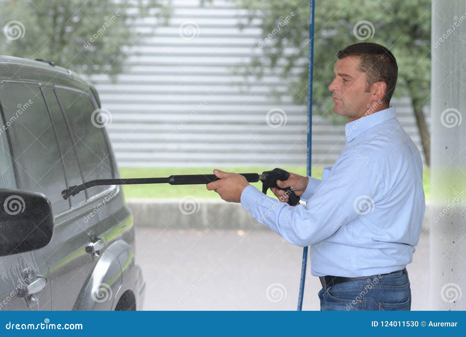 Man power washing car stock photo. Image of wash, male - 124011530