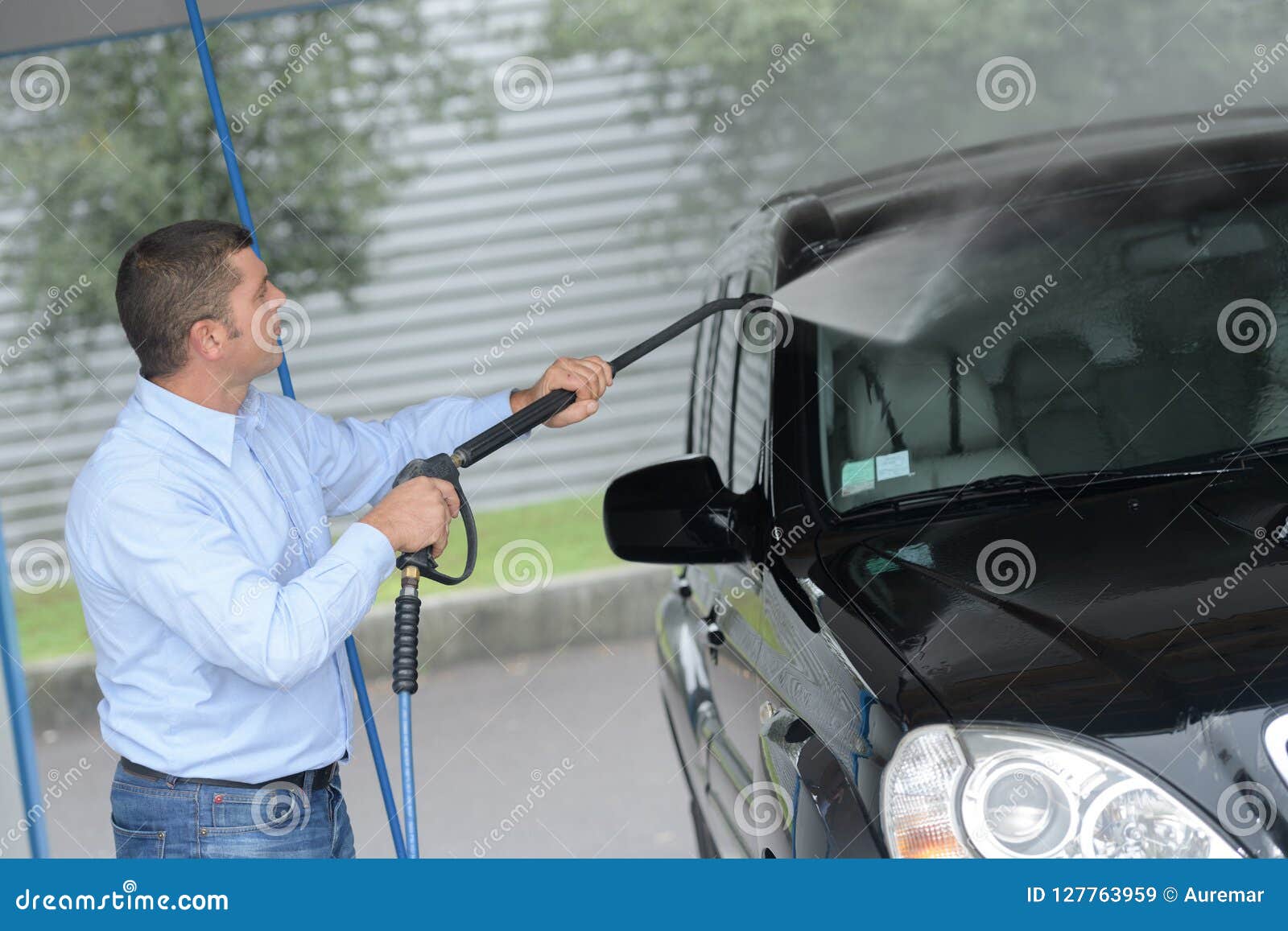 Man power washing vehicle stock image. Image of care - 127763959