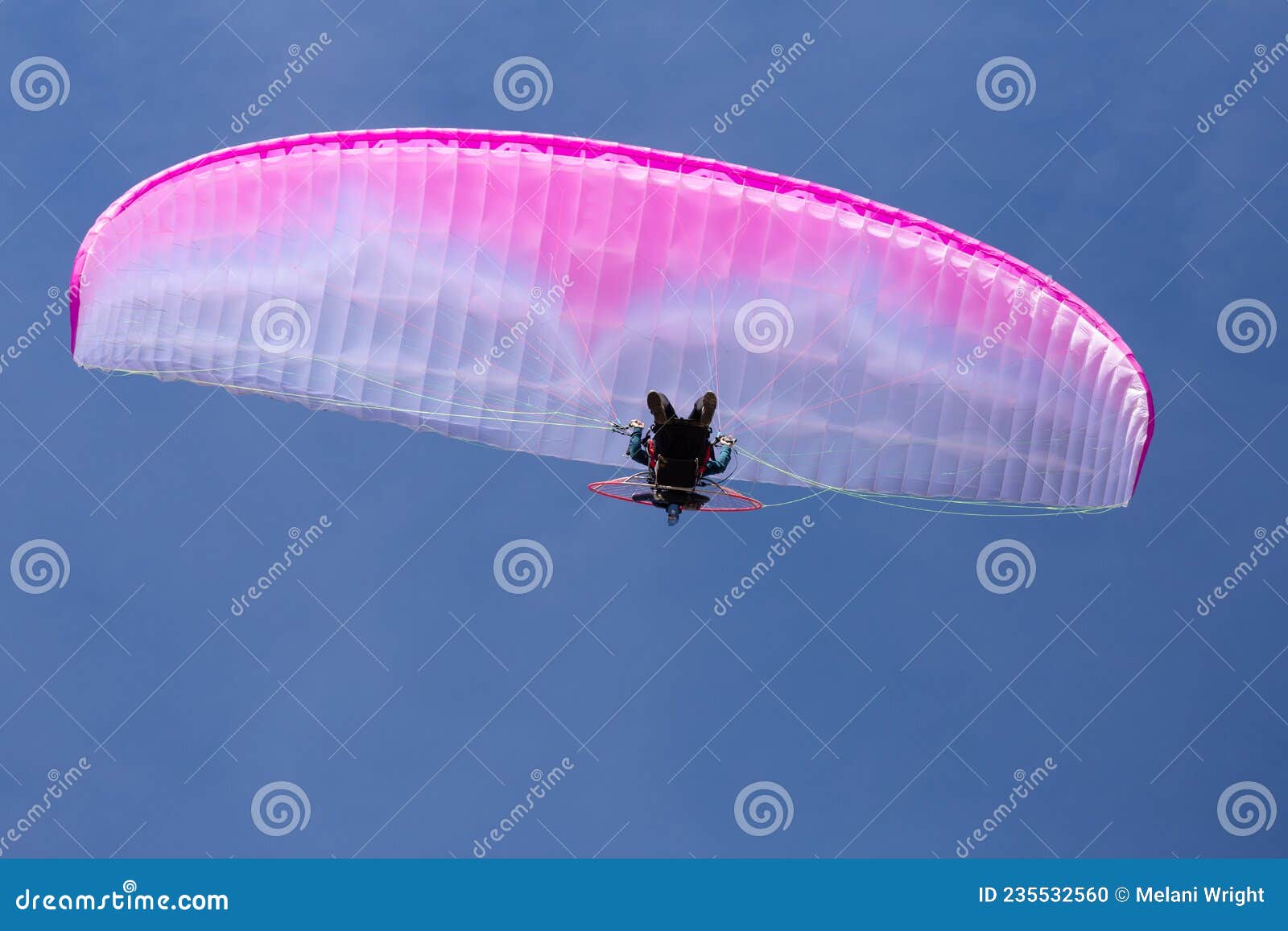 Man in Powered Parasail Directly Overhead Stock Photo - Image of ...
