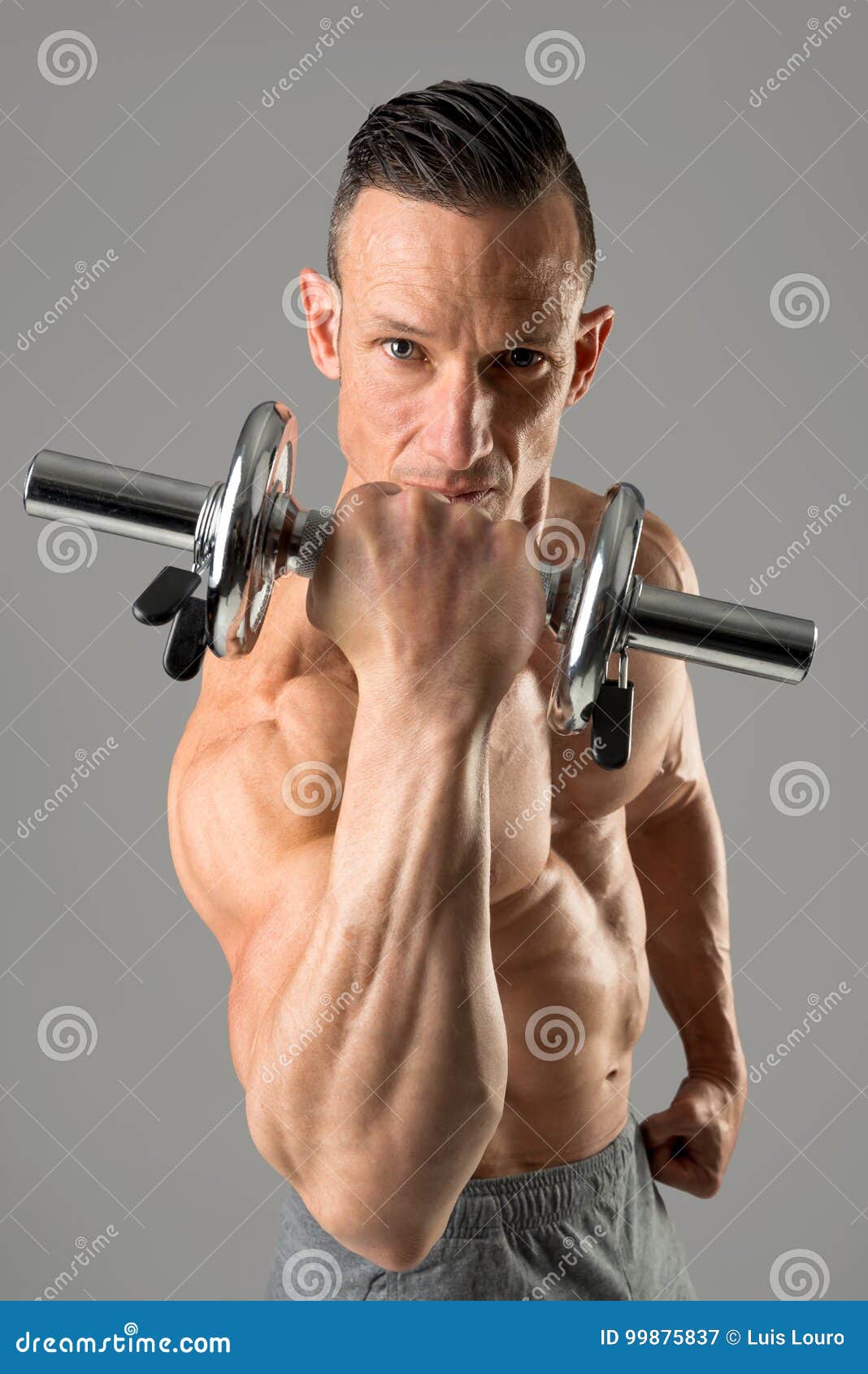 Man with dumbbell stock image. Image of bodybuilding - 99875837