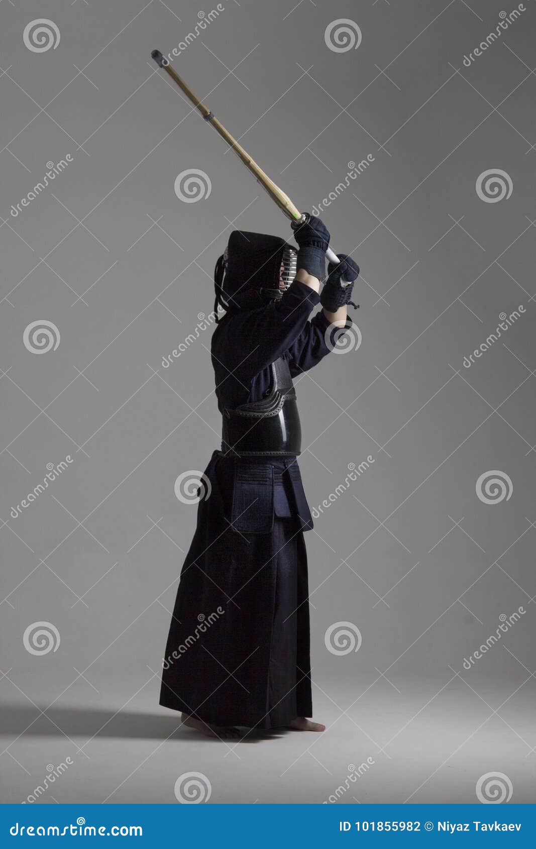 Man is Practicing Kendo in Traditional Armor .he Swinging with Bamboo ...