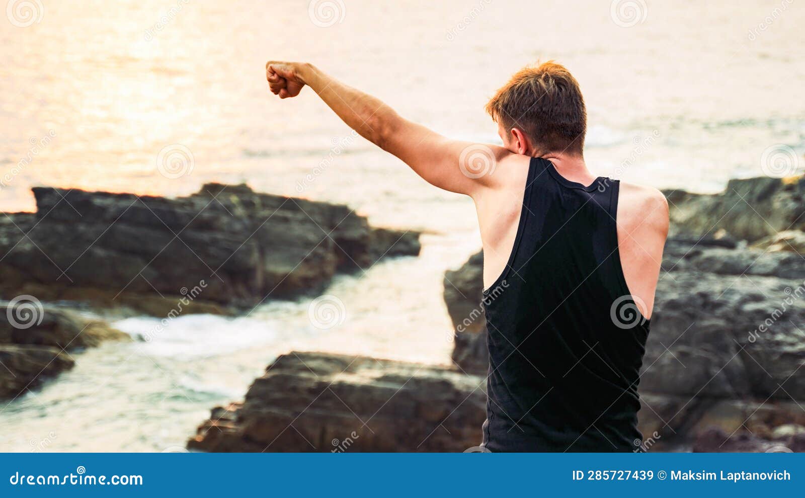 Man Practicing a Left Punch in Boxing on the Coast Stock Image - Image ...