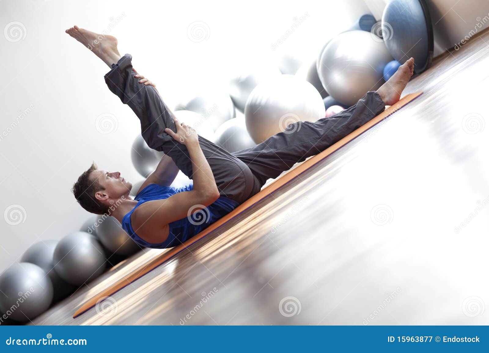 Man practicing pilates stock image. Image of growth, core - 15963877