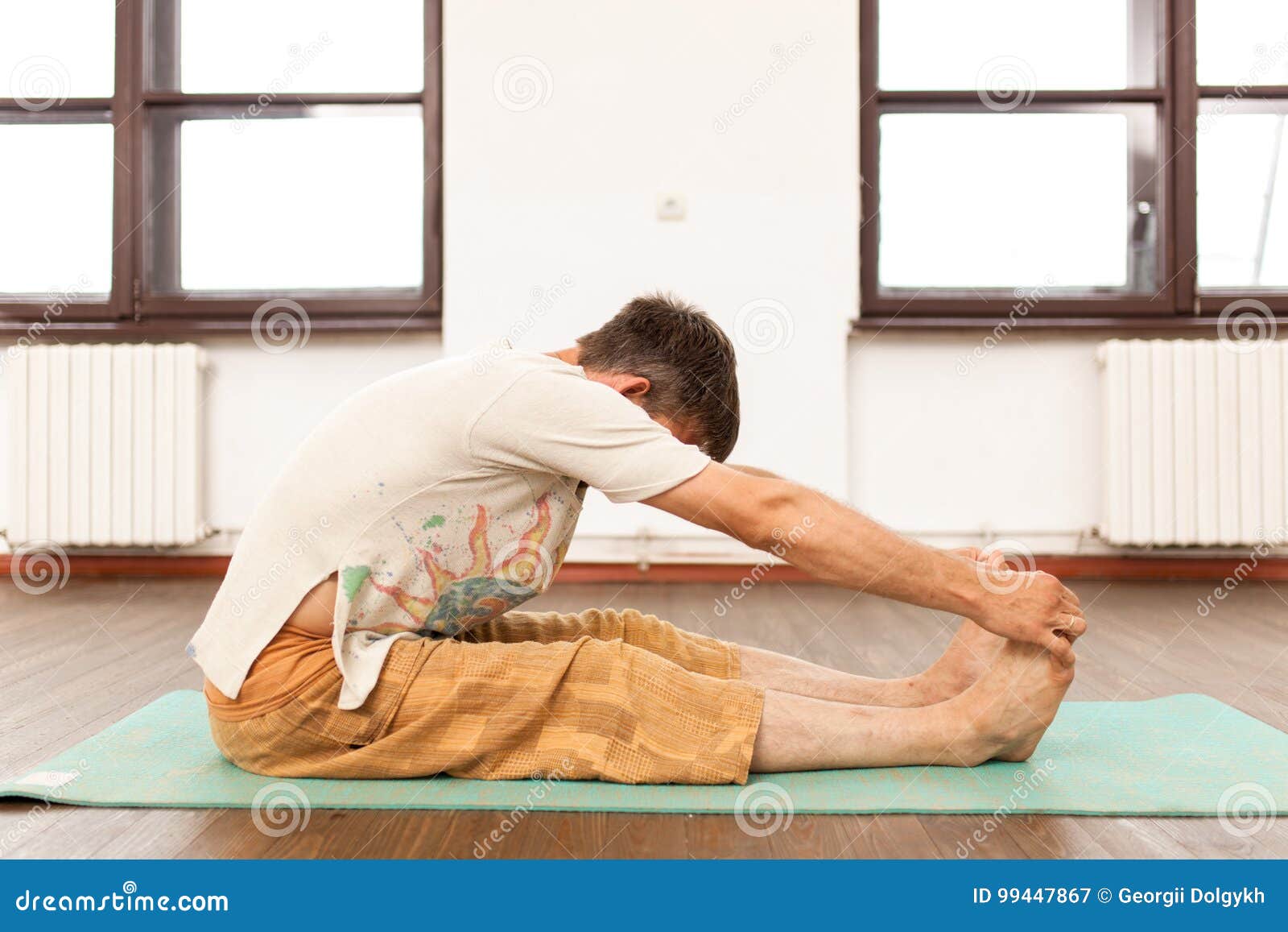 Man practicing yoga stock image. Image of adult, healthy - 99447867