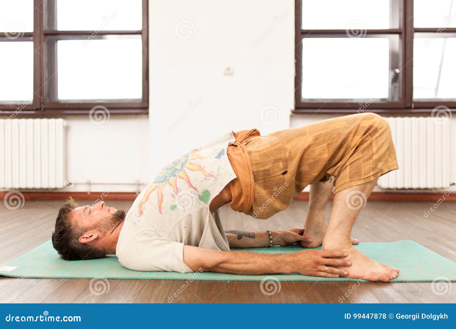 Man practicing yoga stock photo. Image of relax, symbol - 99447878