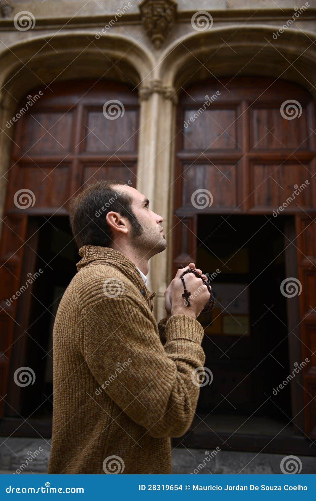 Man Praying in Church Holding Prayer Beads Stock Photo - Image of jesus ...