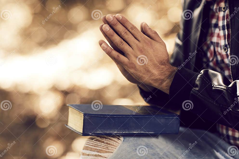 Man praying outdoors stock image. Image of hands, faith - 160554295