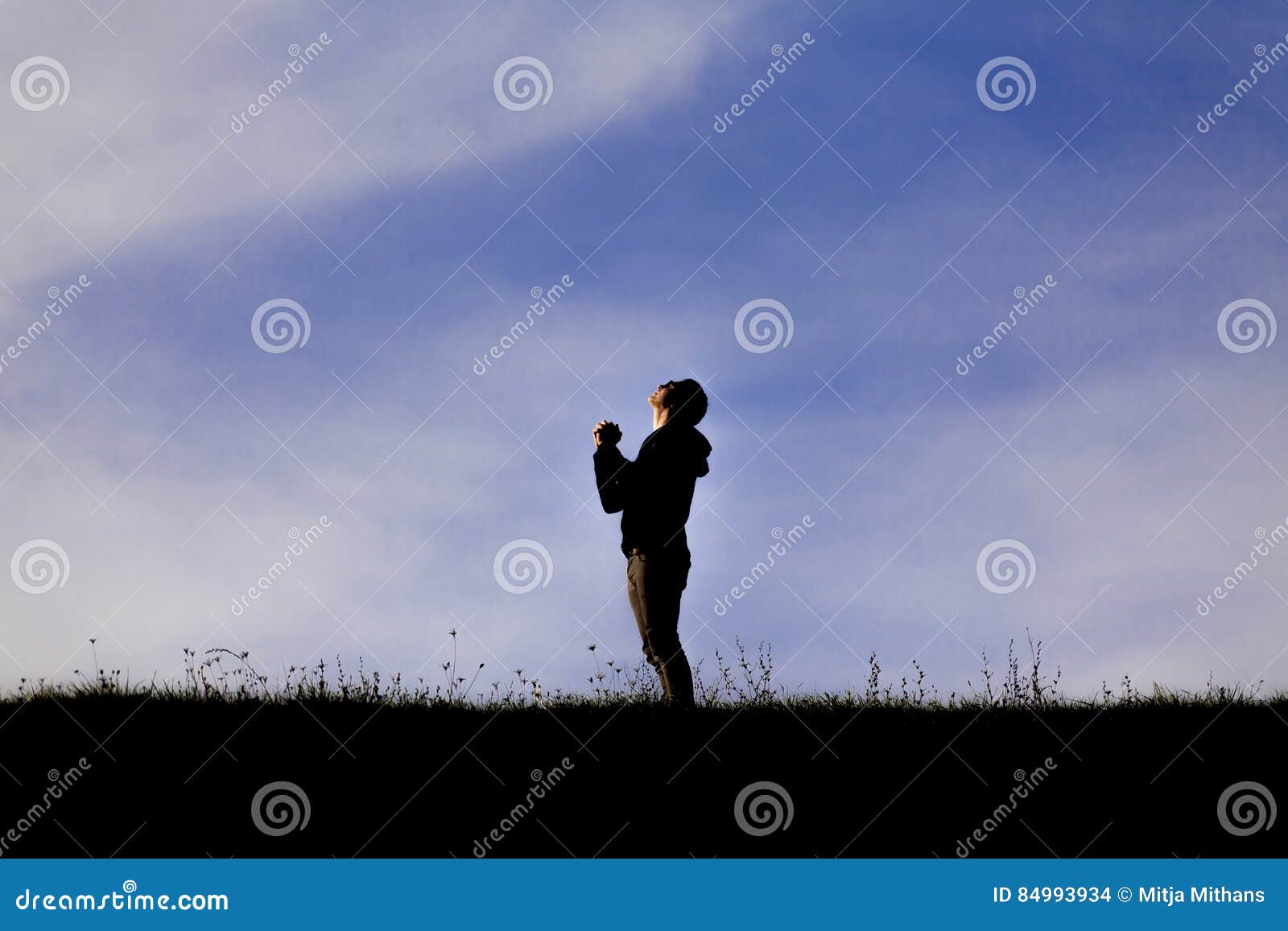 Man praying outside stock photo. Image of person, arms - 84993934