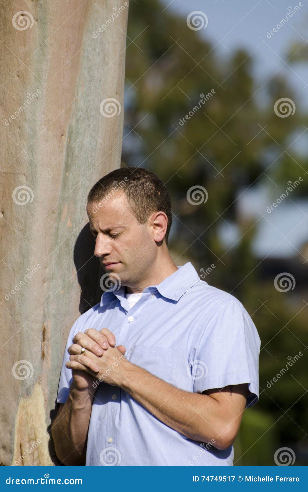 Man praying outside. stock image. Image of focus, bible - 74749517