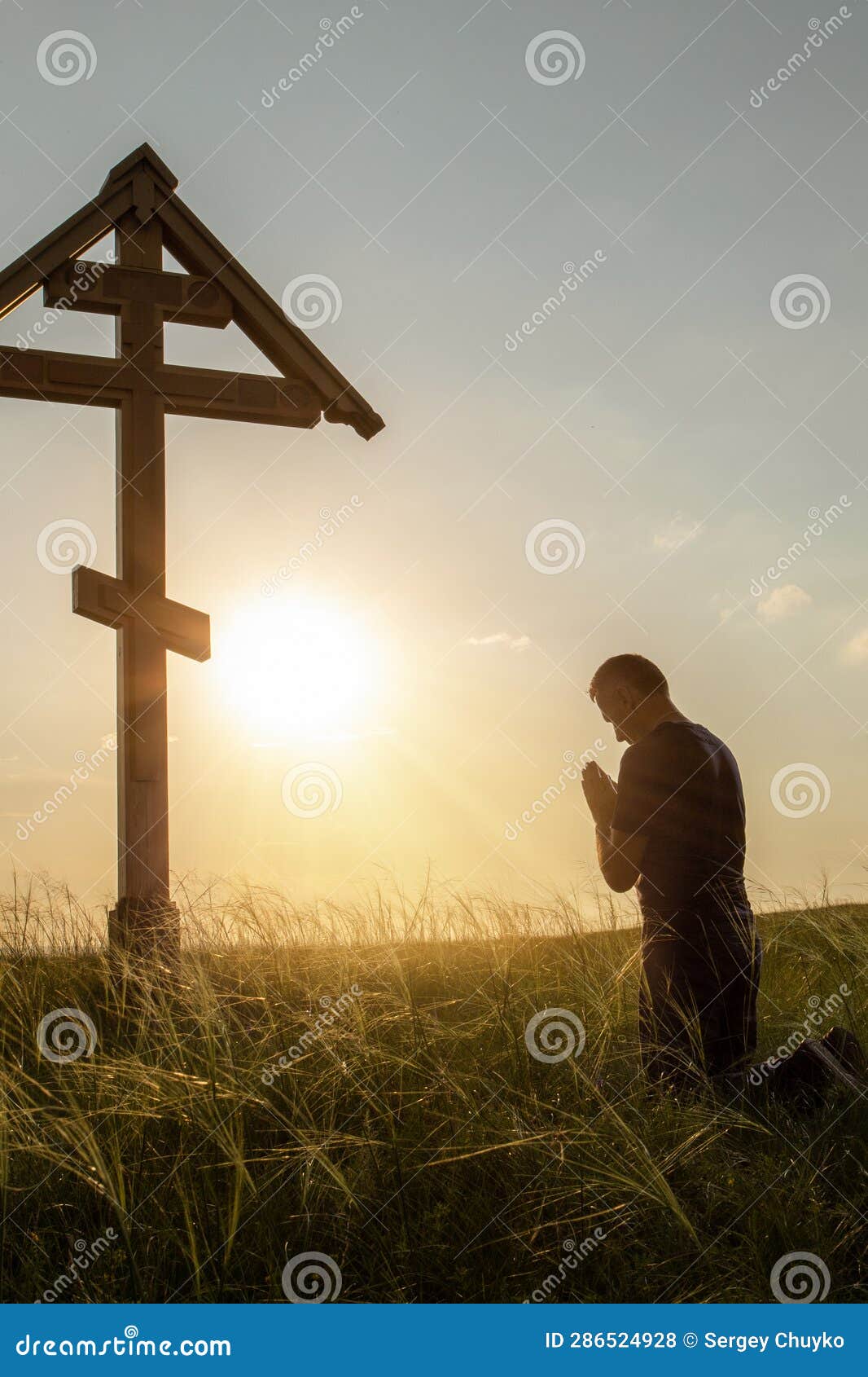 Man Praying Outside stock photo. Image of religious - 286524928