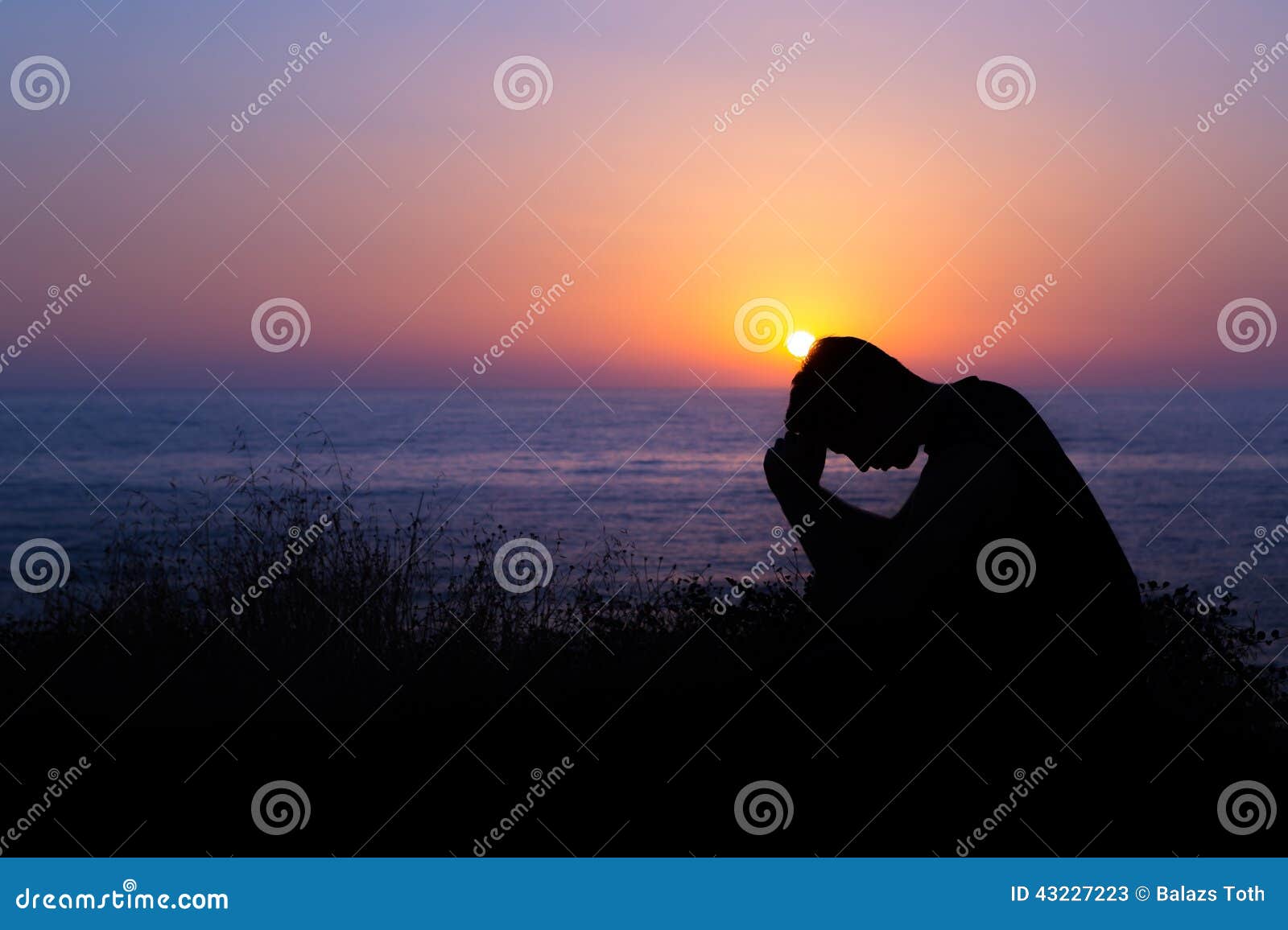 Man Praying by the Sea at Sunset Stock Image - Image of nature ...