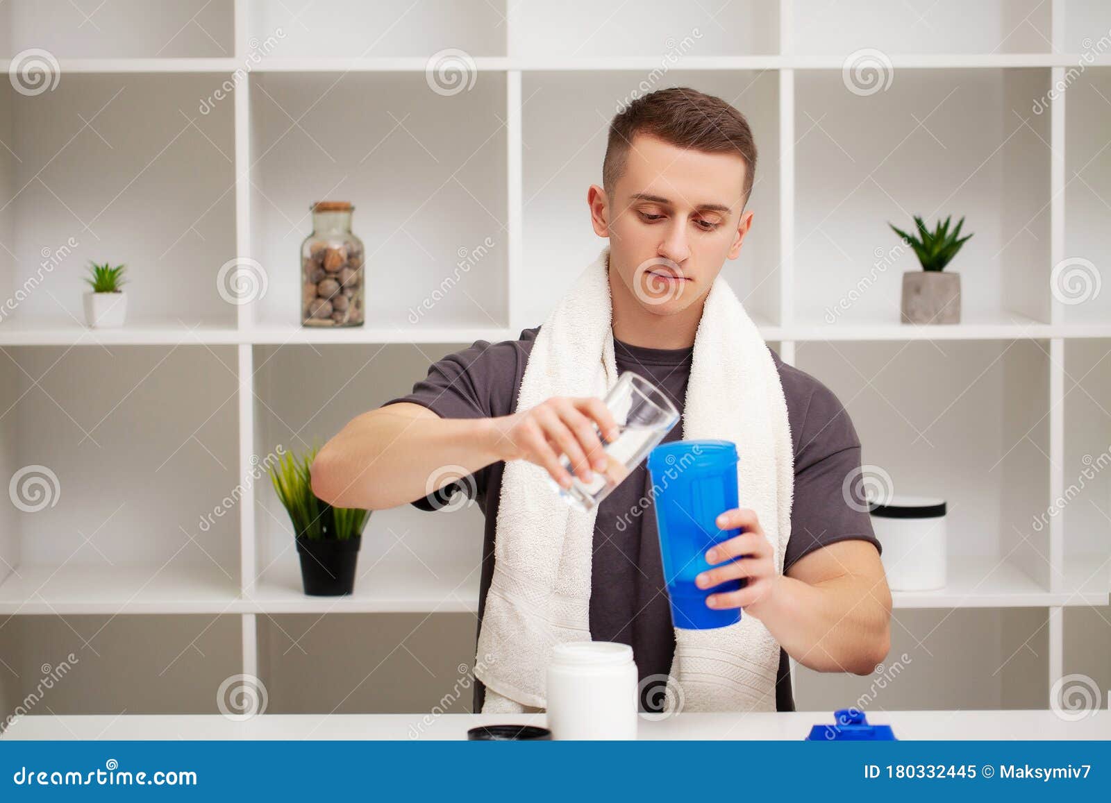 Man Prepares a Protein Shake in the Shaker after Training. Stock Image ...