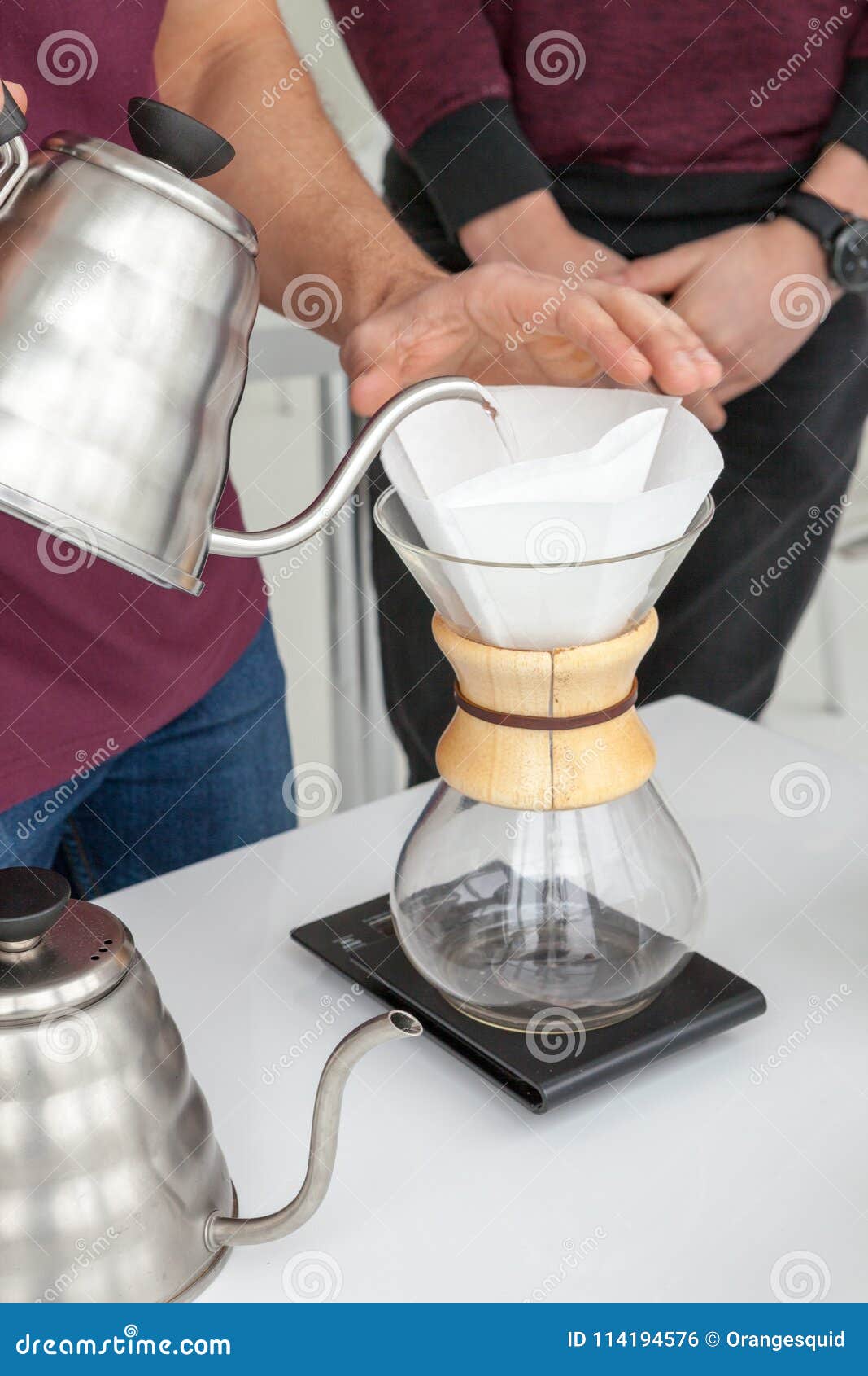 A Man is Preparing Coffee by a Method of Transfusion. Stock Photo ...