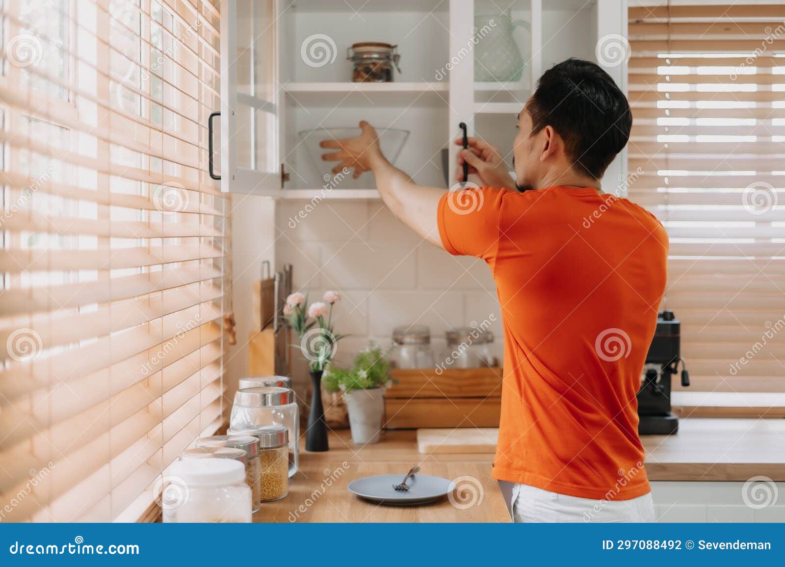 Man Preparing His Easy Breakfast in the Kitchen in Warm Light Morning ...