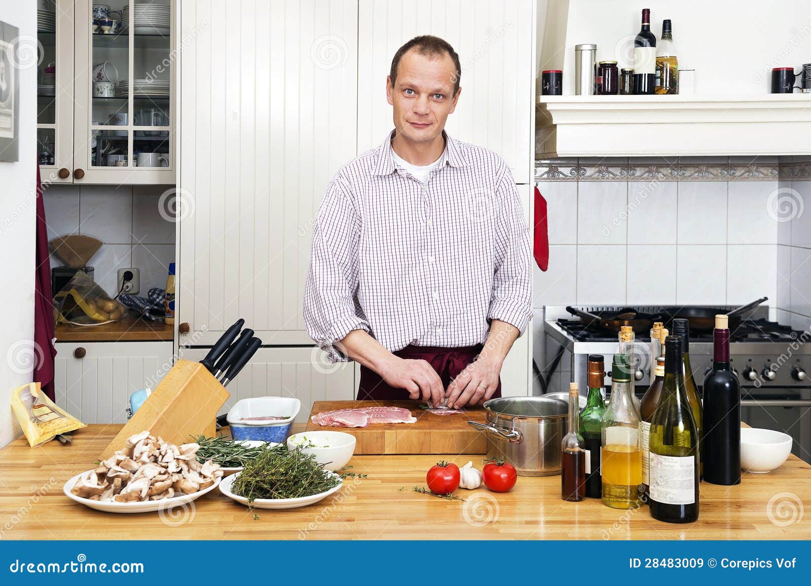 Man Preparing Meat at Kitchen Counter Stock Image - Image of meat ...