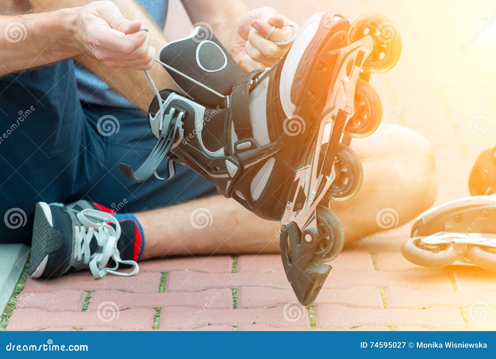 Man Preparing for Roller Blading, Stock Image - Image of people ...