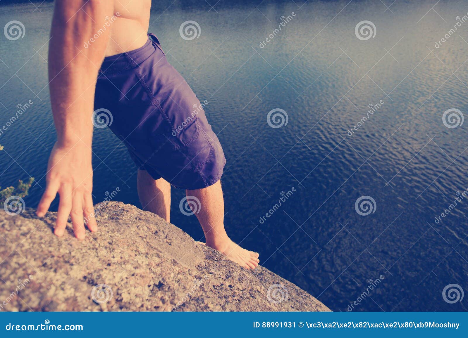 Man Preparing To Jump into the Water Stock Image - Image of male ...
