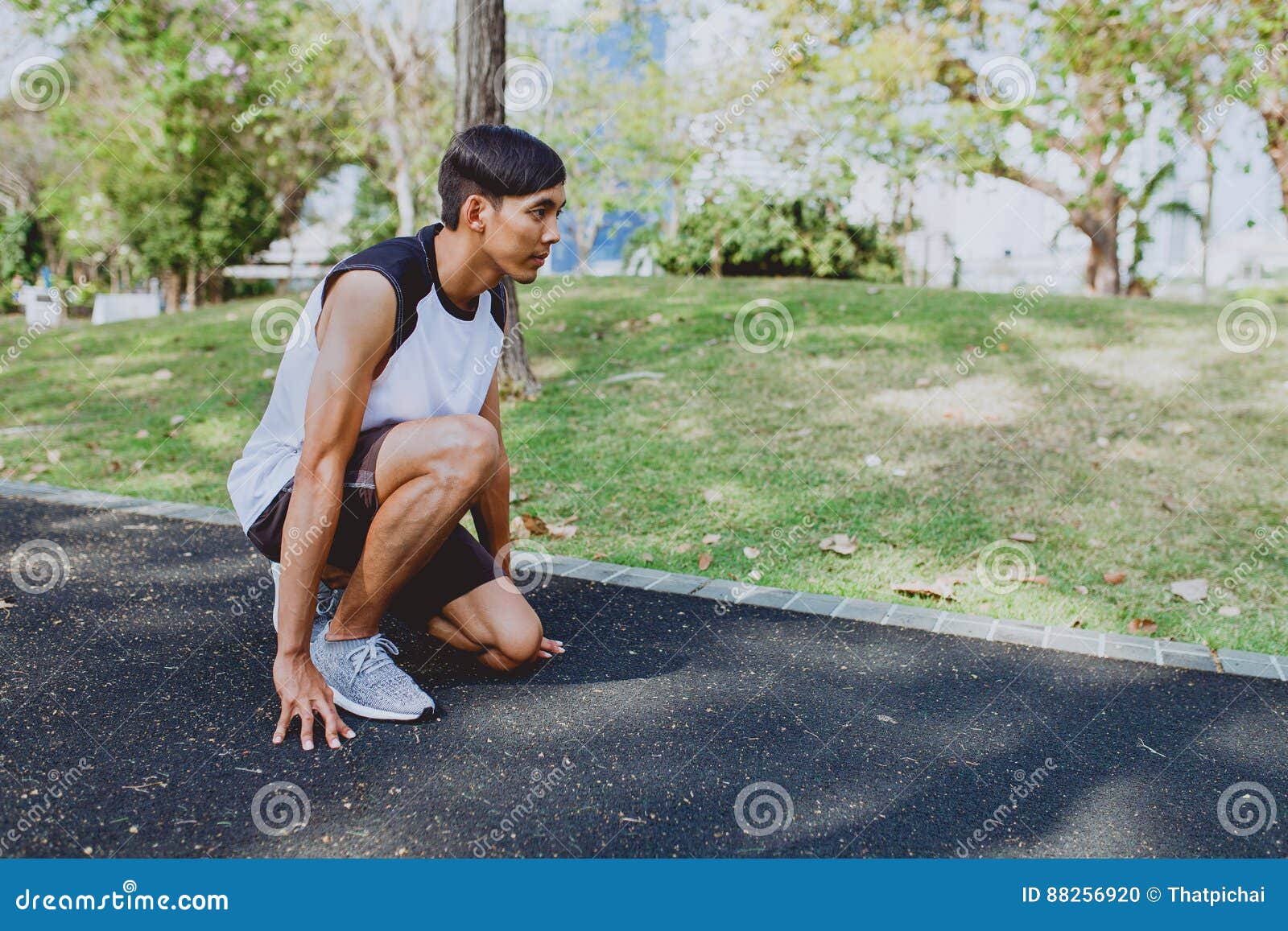 Man Preparing To Run in Park Stock Photo - Image of fitness, sprint ...