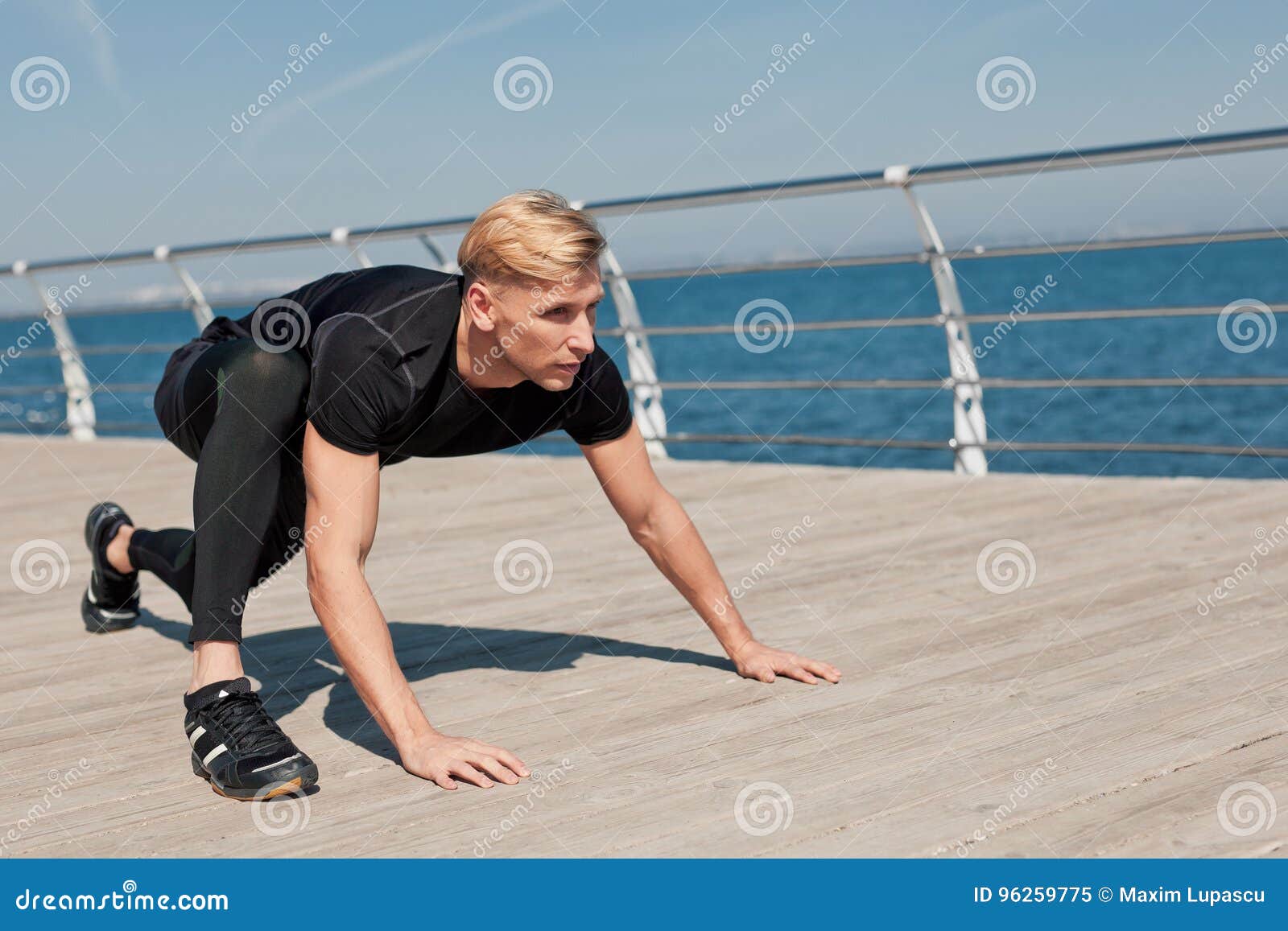 Man Preparing To Sprint on Pier Stock Image - Image of athletics, speed ...