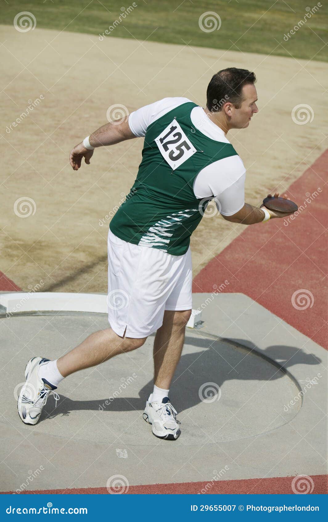 Man Preparing To Throw Discus Stock Image - Image of holding, athlete ...