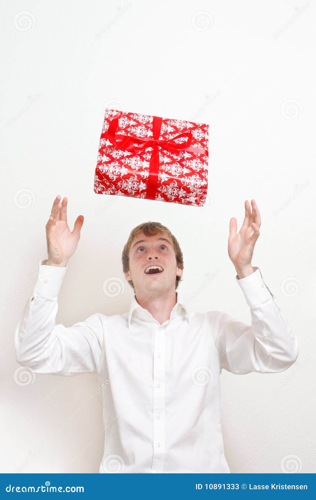 Man with present stock image. Image of excited, christmas - 10891333