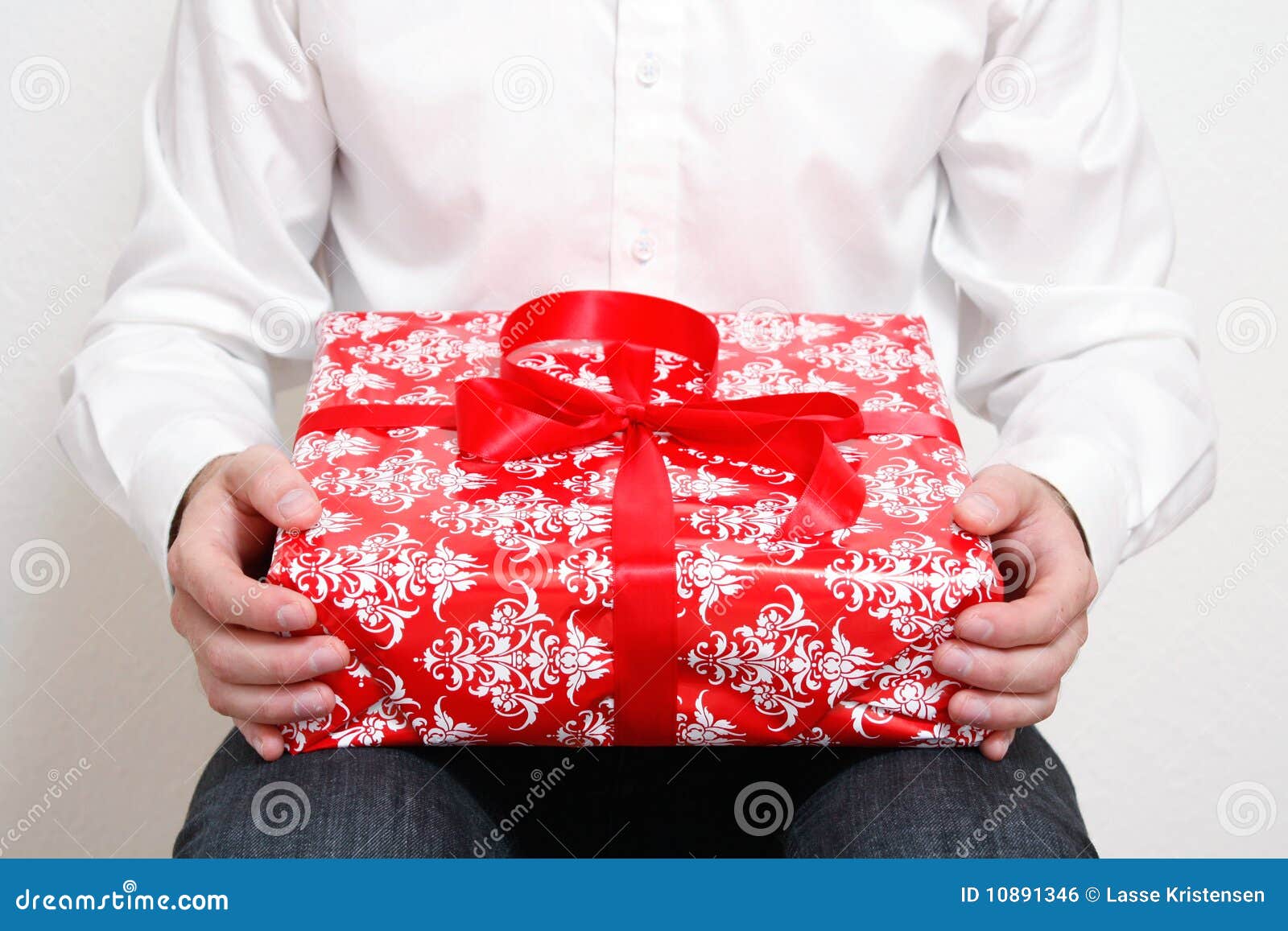 Man with present stock photo. Image of holding, wrapped - 10891346