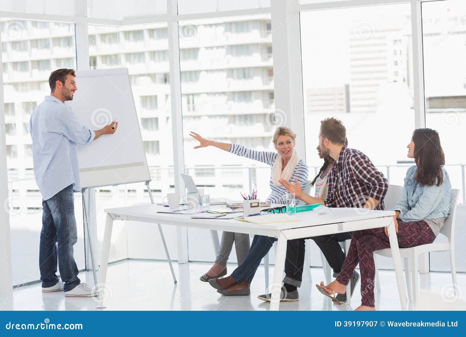 Man Presenting an Idea To His Colleagues Stock Image - Image of ...