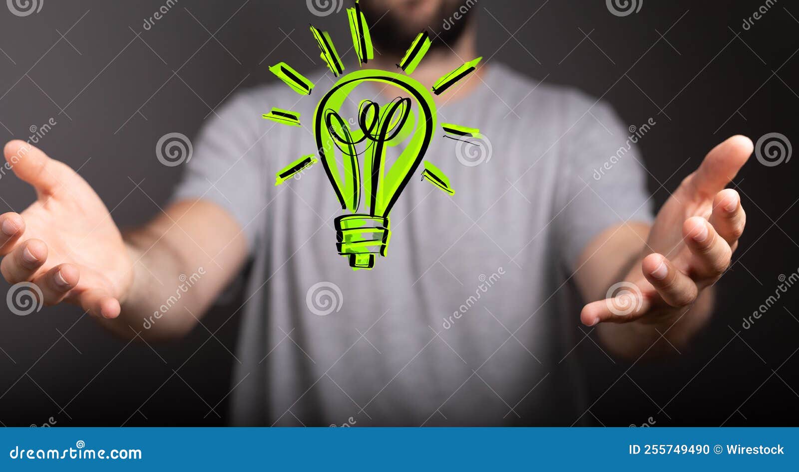 Man Presenting an Illustrated Light Bulb between the Hands Stock Photo ...