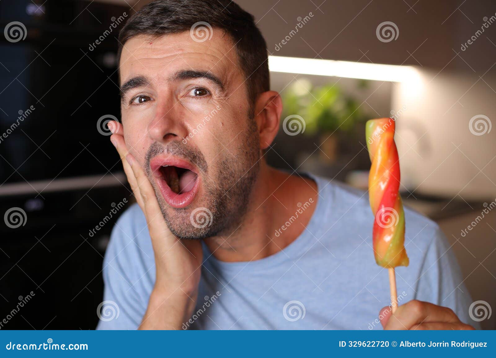 Man Presenting Teeth Sensitivity with Cold Food or Drinks Stock Photo ...